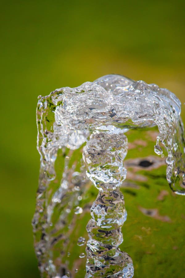 Vertical Shot of Water with an almost Rectangular Shape about To Splash ...