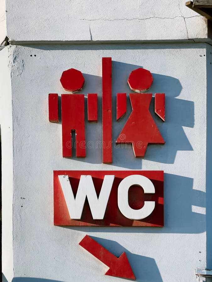 Vertical Shot of a WC Sign in Red and White Colors Stock Image - Image ...