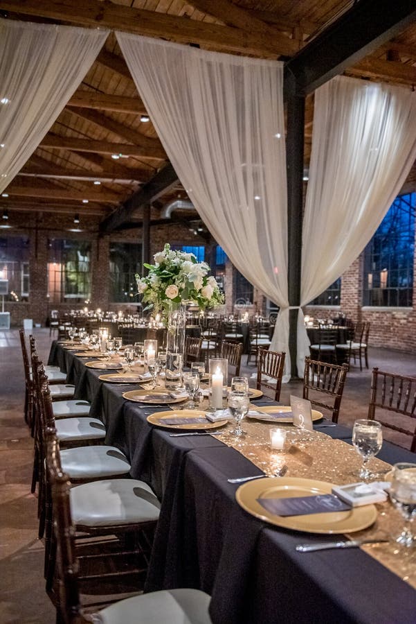 Vertical Shot of a Wedding Hall with Elegant Table Setting Stock Photo ...