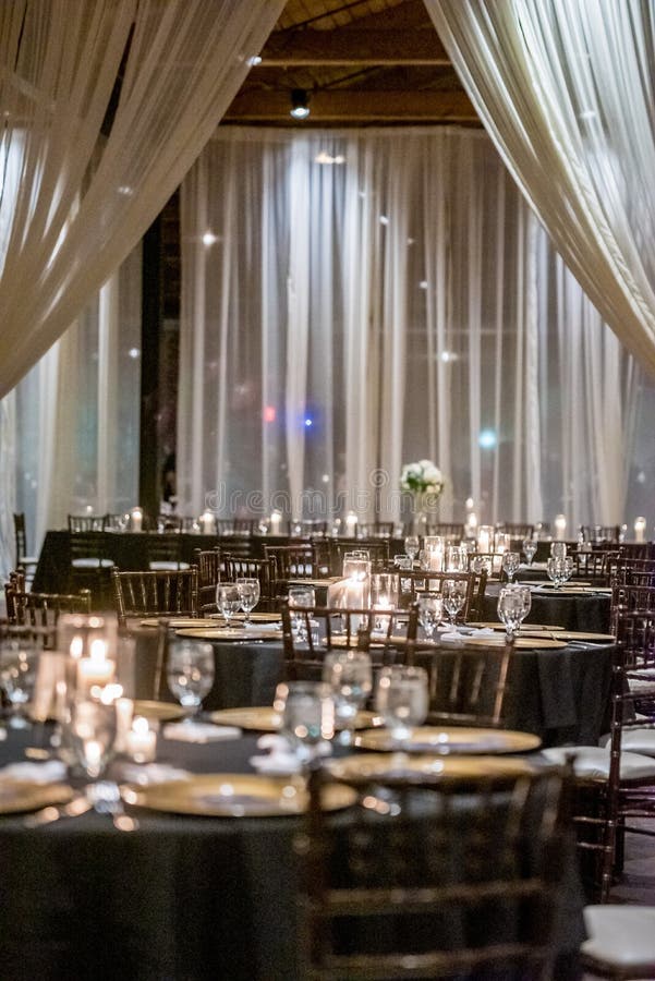 Vertical Shot of a Wedding Hall with Elegant Table Setting Stock Photo ...