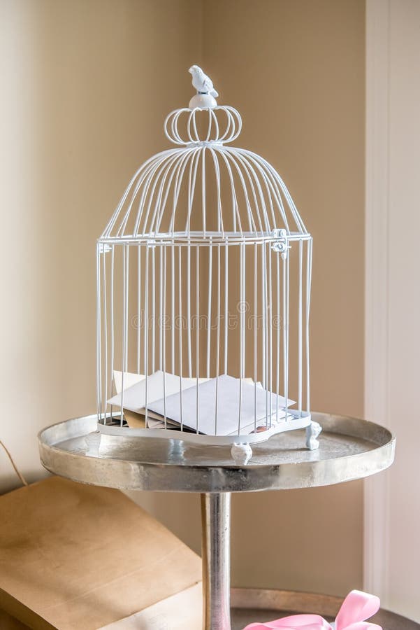 Vertical Shot of a White Birdcage Filled with Numerous Letters Stock ...