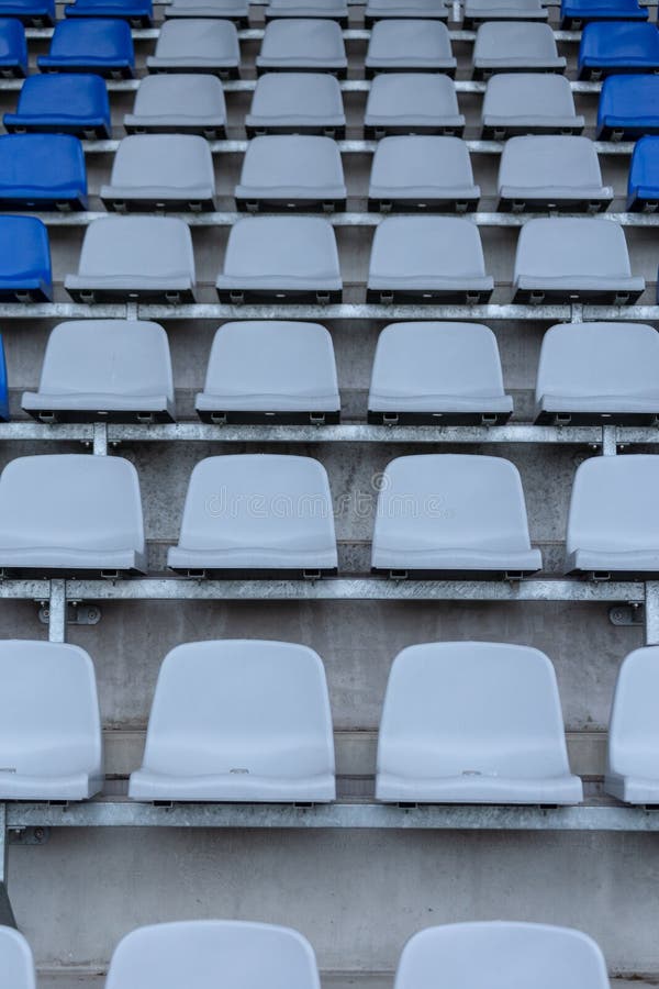 Vertical Shot of the White and Blue Plastic Stadium Seats Stock Image ...