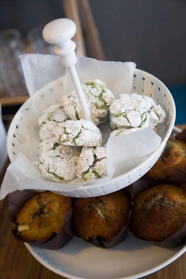 Vertical Shot of White Cookies and Cupcakes Stock Photo - Image of ...