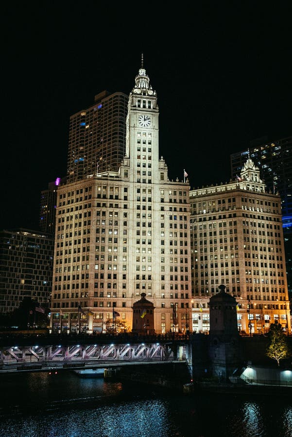 Vertical Shot of the Wrigley Building during the Night in Chicago ...