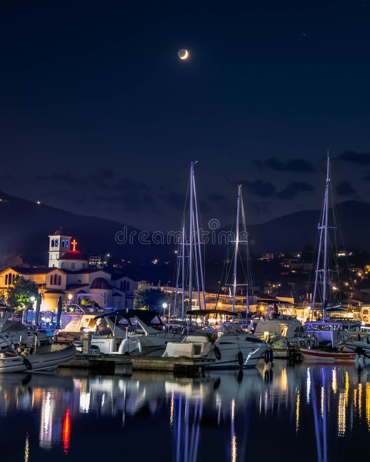 Vertical Shot of Yachts Parked at the Dock and Buildings in the ...