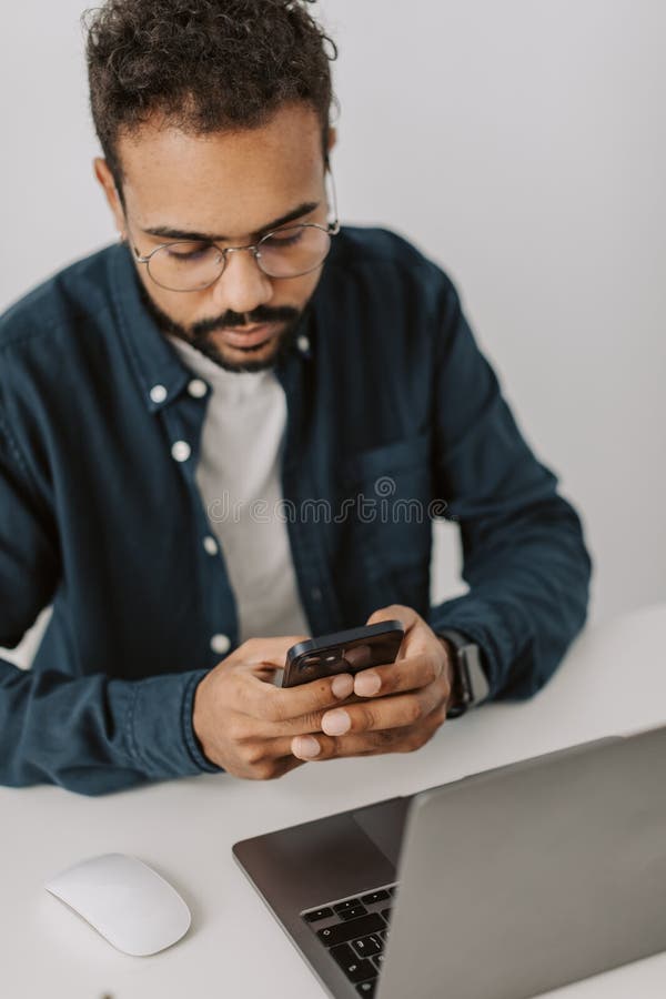 Vertical Shot Young African American Guy Hold Cellphone Scrolling