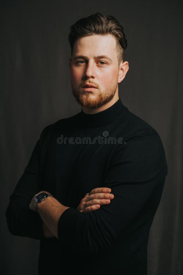 Vertical Shot of a Young Caucasian Man with a Serious Face Expression ...