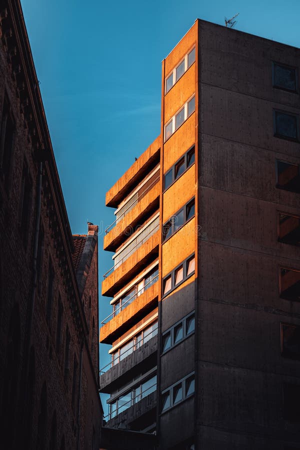Vertical Side Shot of a Skyscraper at Sunrise with Blue Sky in the ...