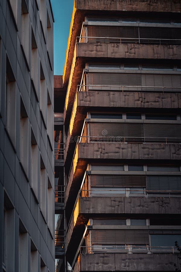 Vertical Side Shot of a Skyscraper at Sunrise with Blue Sky in the ...