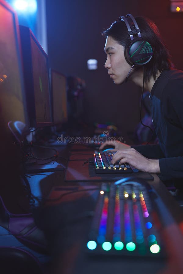 Asian Man Playing Video Game Stock Photo - Image of computer, habit ...