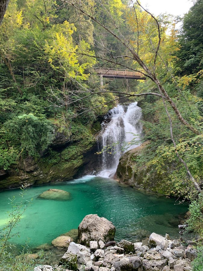 Vertical of a Small Waterfall Falling into a Plunge Pool Stock Photo ...