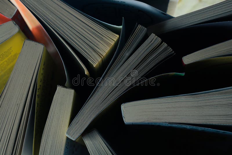 Vertical Stack of Books with Silhouette in City Library Stock Photo ...