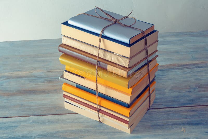Vertical Stack of Books Tied with Rope. Copy Space Stock Image - Image ...