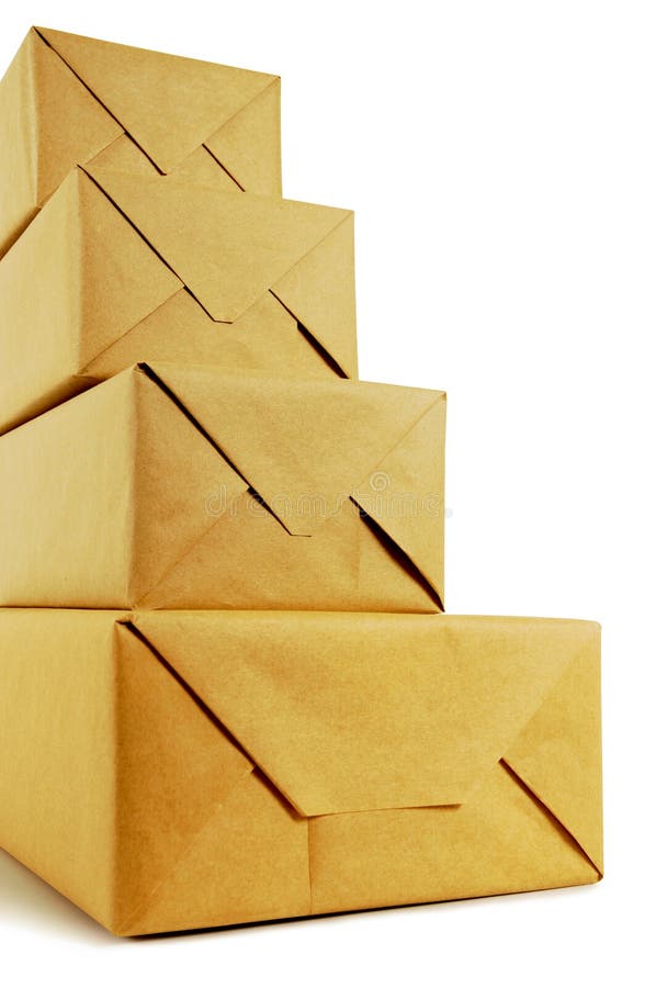 Vertical Stack of Small Brown Paper Wrapped Packages Isolated on White ...
