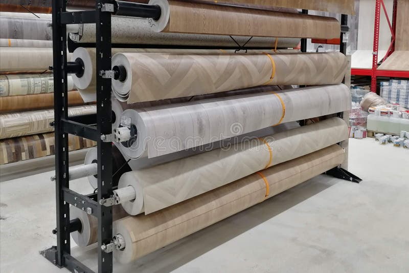 Rolls of New Linoleum on the Window of a Hardware Store. a Large ...