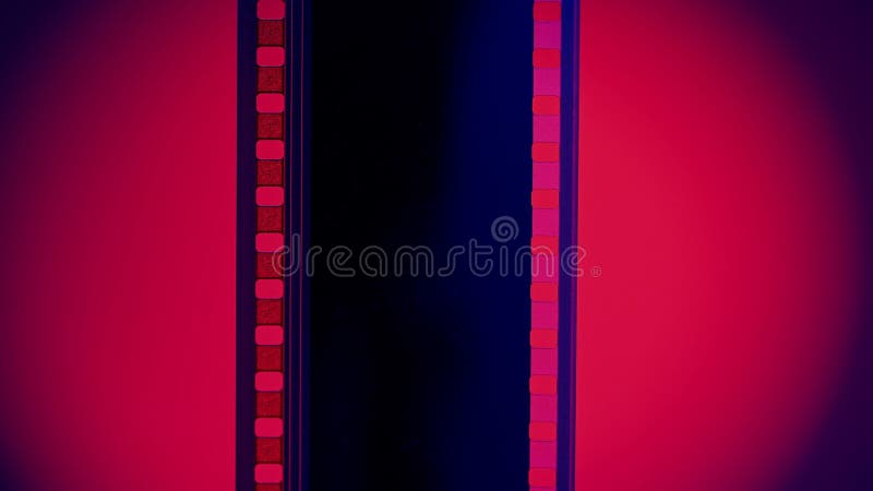 Vertical Strip of Blank Film on a Blue Background with a Red Circular ...