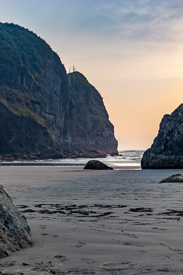 Vertical of Sun and Rock Formations at Ruby Beach Stock Photo - Image ...