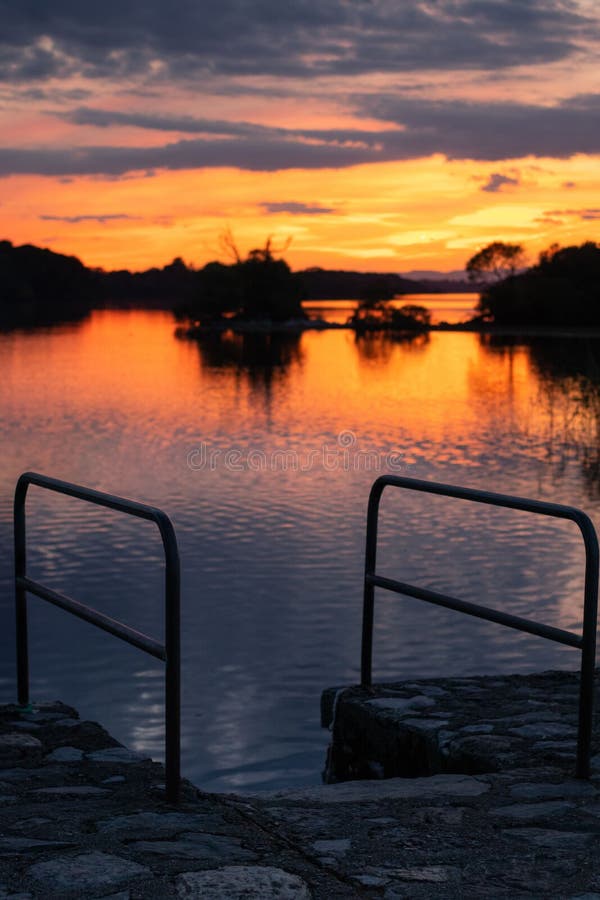Vertical of Sunset Over a Landscape Seen from a Cave Stock Image ...