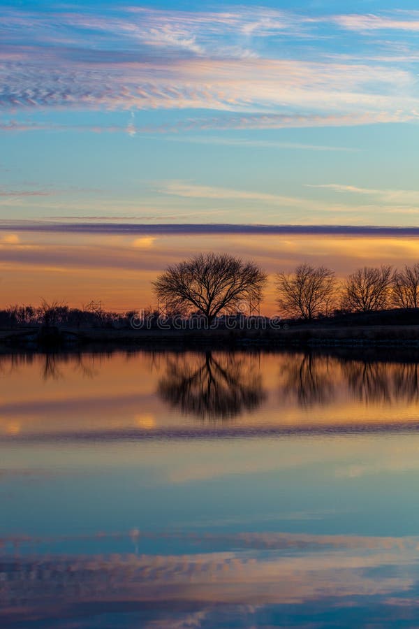Sunset Symmetry stock image. Image of sailboat, leaf - 60824945