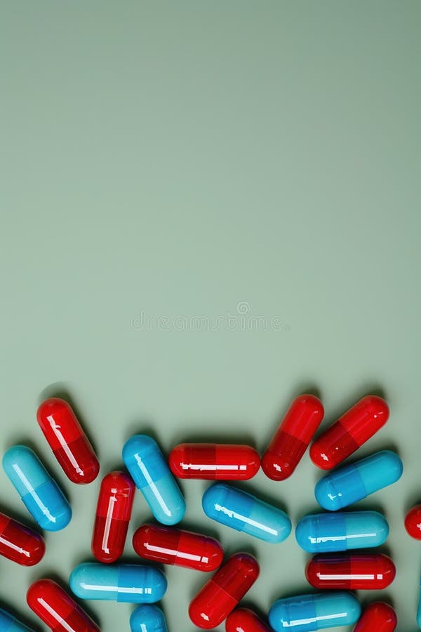 Vertical Template Frame Red and Blue Pills and Capsules Top View with ...