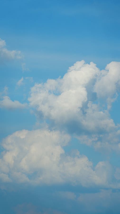 Blue Sky Background with Tiny Clouds. Low Angle View. Blue Clear Sky ...