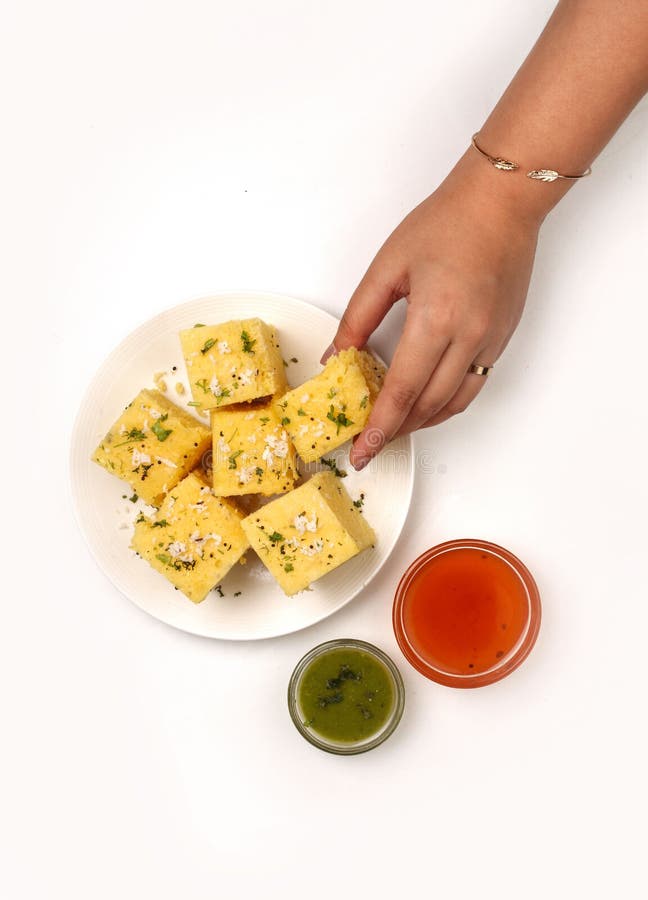 Vertical Top View of Dhokla Gujarati on a White Plate with Two Sauces ...