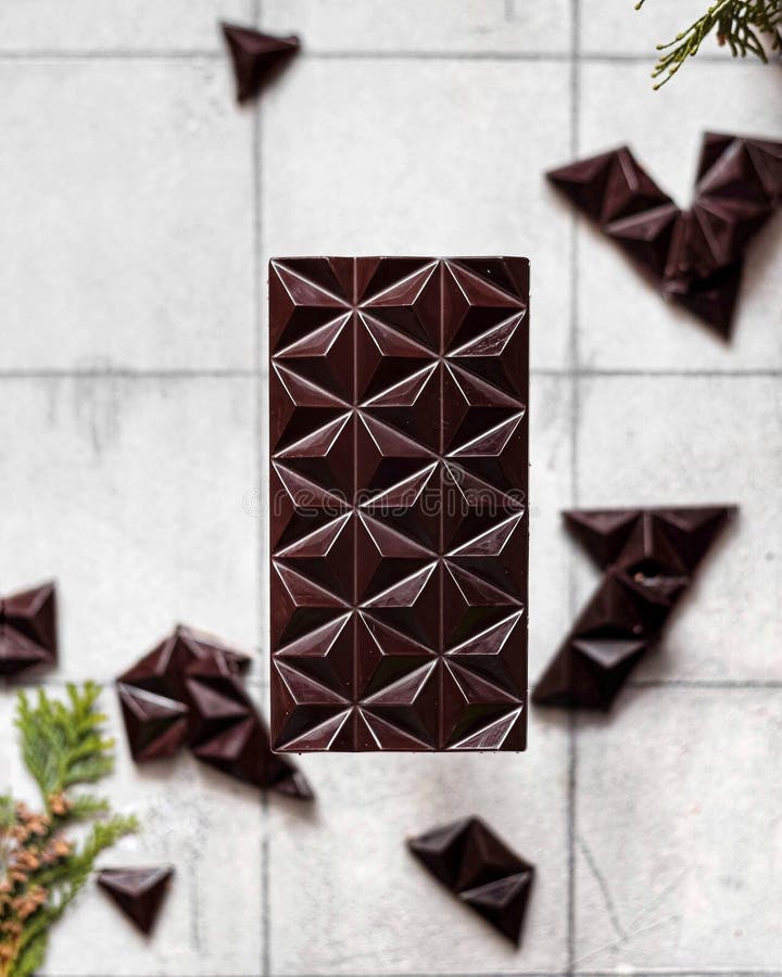 Vertical Top View of a Gourmet Dark Chocolate Bar with a Triangular ...