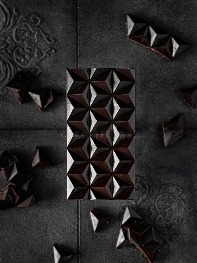 Vertical Top View of a Gourmet Dark Chocolate Bar with a Triangular ...