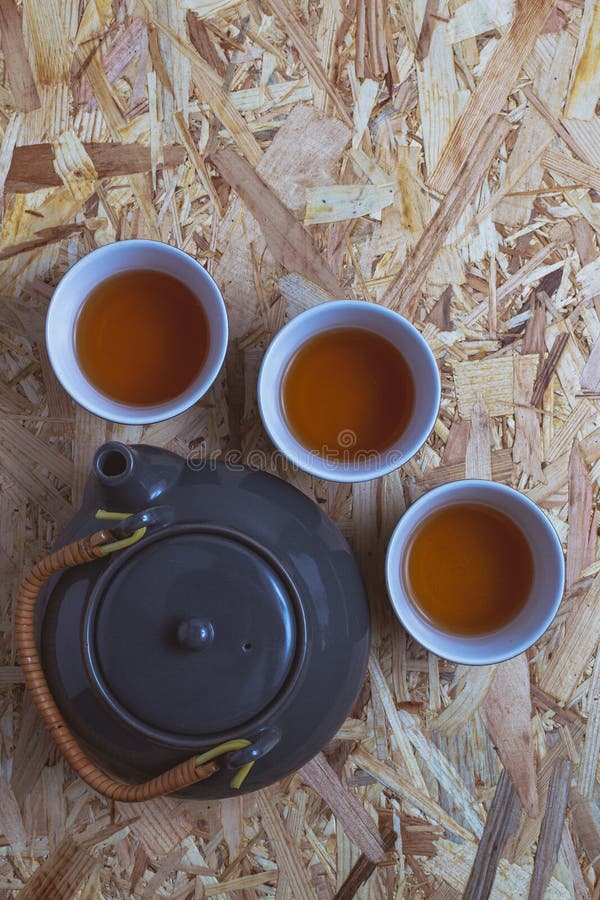 Vertical Top View of Gray Tea Set on a Pressed Wooden Panel Surface ...