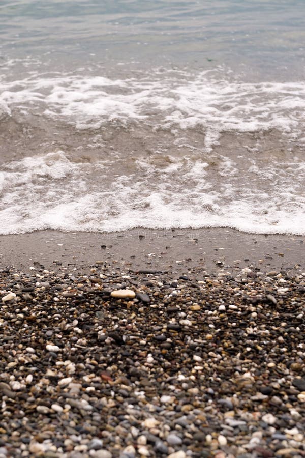 Vertical Top View of Pebble Beach and Stone Coastline Stock Photo ...