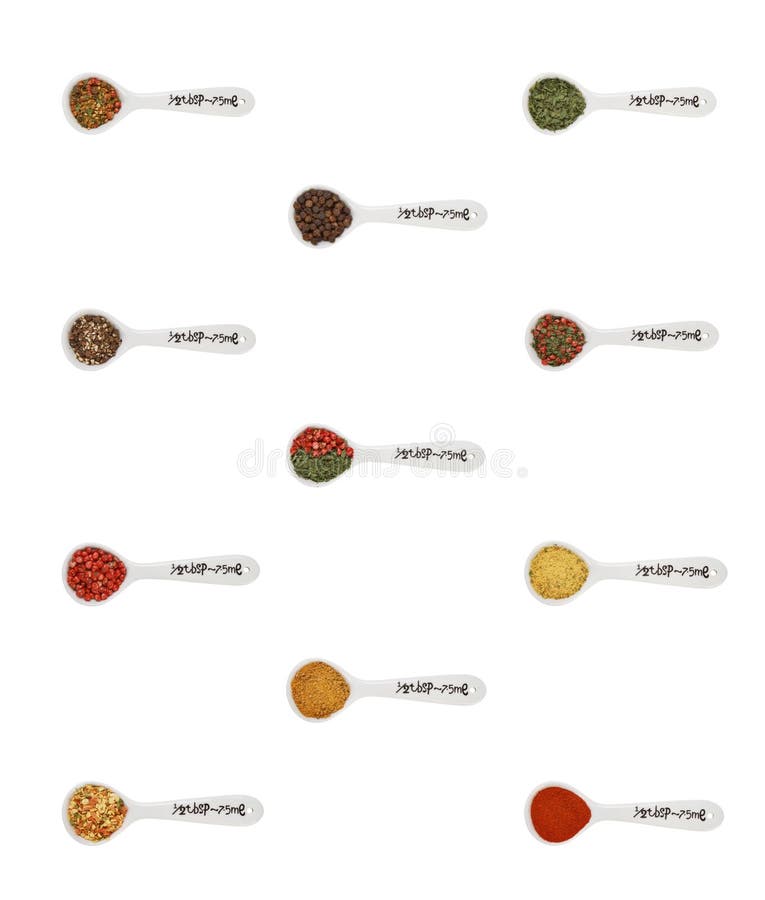 Vertical Top View Shot of Various Spices on a White Surface Stock Image ...