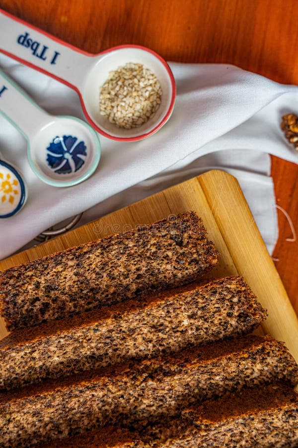 Vertical Top View of Sliced Walnut Bread and Spoons on the Table Stock ...