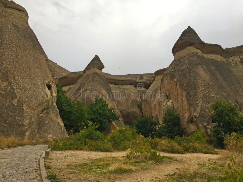 Vertical Towers of Rock Formations Reaching Toward a Cloudy Sky Stock ...
