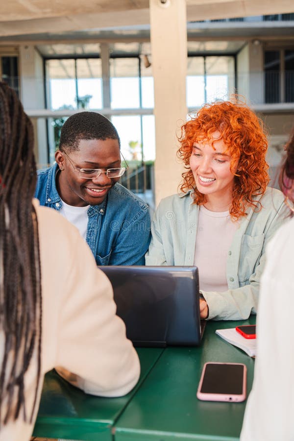 Vertical. Two Multiracial Teenage Students Smiling while Learning the ...