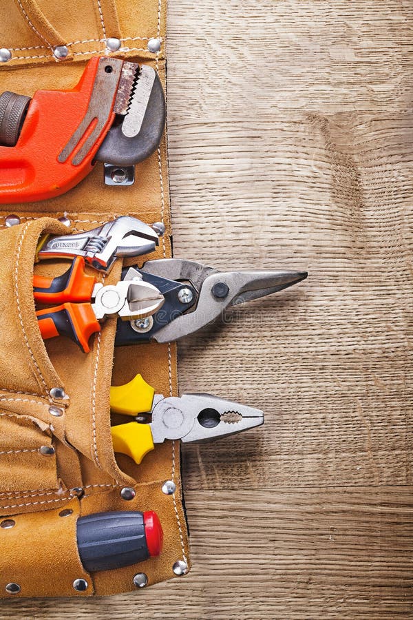 Vertical Version Working Tools in Toolbelt on Wooden Board Stock Photo ...