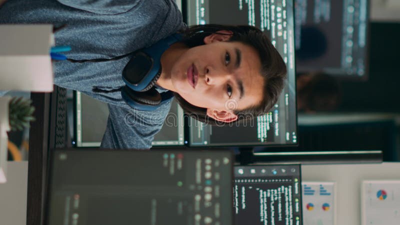 Vertical Video Asian System Engineer Asking Coder For Help With Html