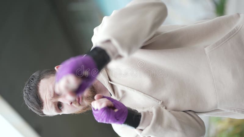 Vertical Video of an Athlete Guy Boxer Who is Training Stock Video ...
