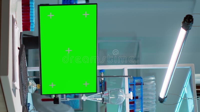 Vertical Video: Chemists Working in Background of Lab Using Pc with ...