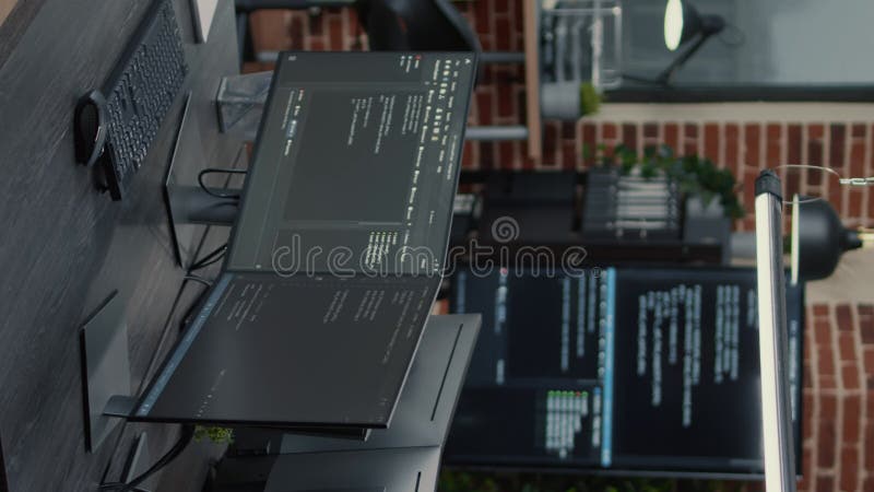 Computer Screens on Desk in Empty Software it Agency Office and Computers in Background Stock ...