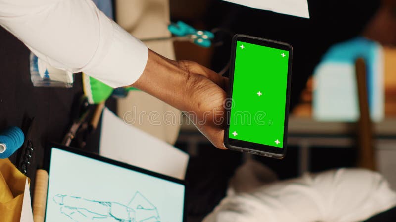 Vertical Video Craftsman Using Greenscreen in Workshop Stock Video ...