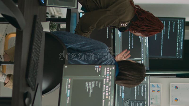 Vertical Video: Database Admins Collaborating on Group Project ...