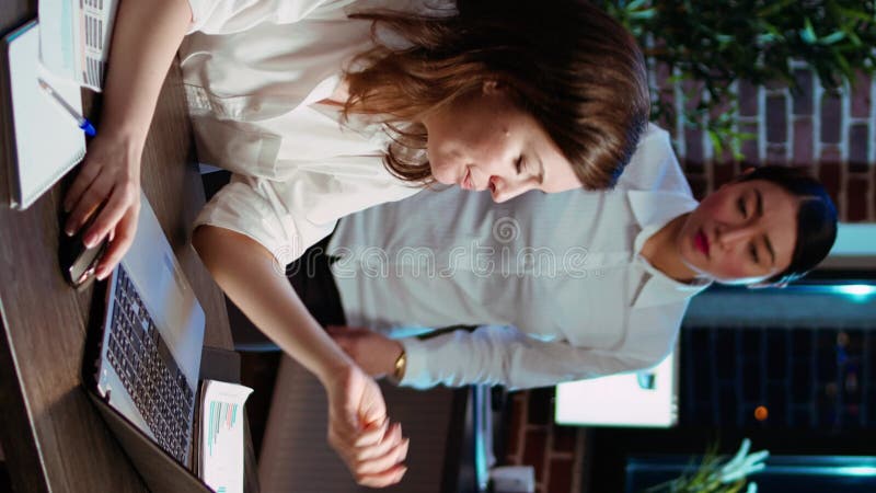 Vertical Video Employee Asking for Help from Coworker after Being Stuck on Project Task Stock ...