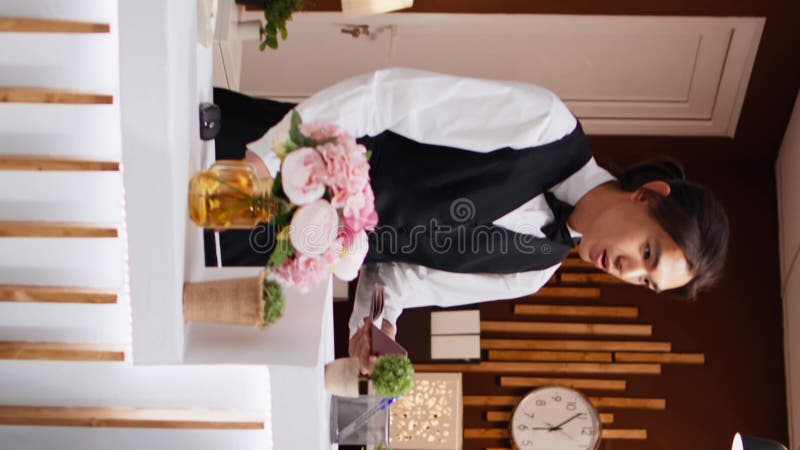 Employee Looking at Passport Info for Guest Identification Stock Video ...