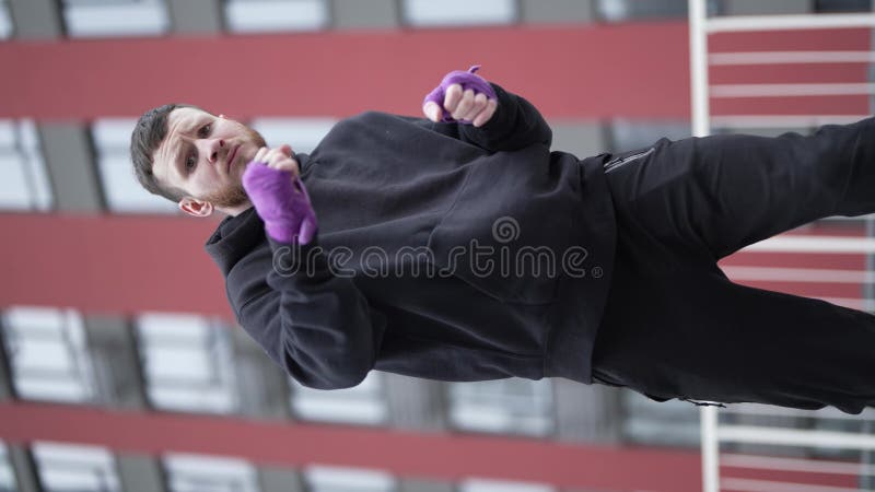 Vertical Video of an Athlete Guy Boxer Who is Training Stock Footage ...