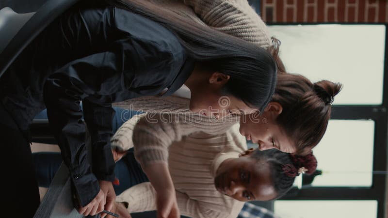 Vertical Video Mixed Team of Software Engineers Brainstorming Ideas for New Code Library in ...