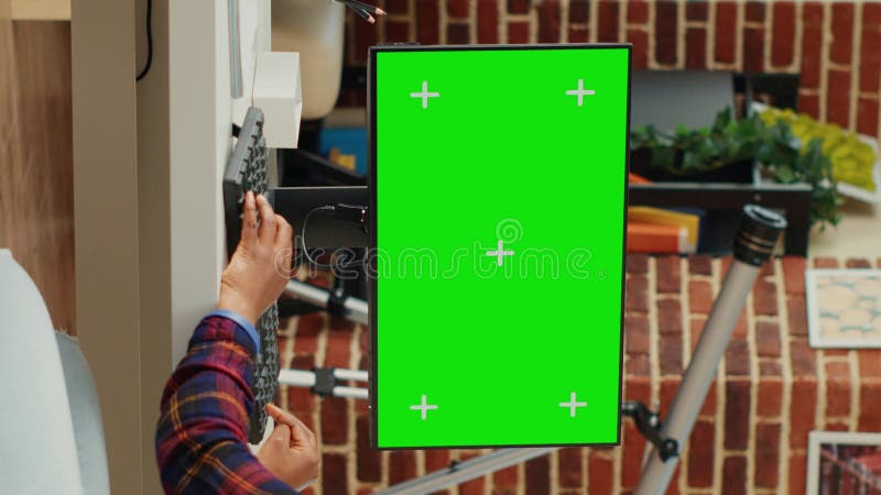 Vertical Video: Office Employee Wearing Headphones and Using Greenscreen Stock Footage - Video ...