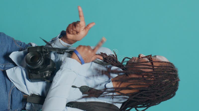 Photographer Pointing at Left and Right Side in Studio Stock Video ...