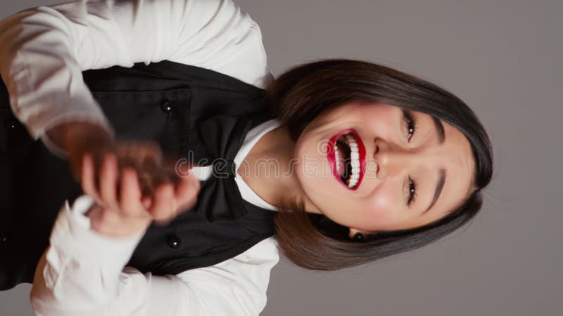 Vertical Video Restaurant Hostess Clapping Hands and Celebrating for ...