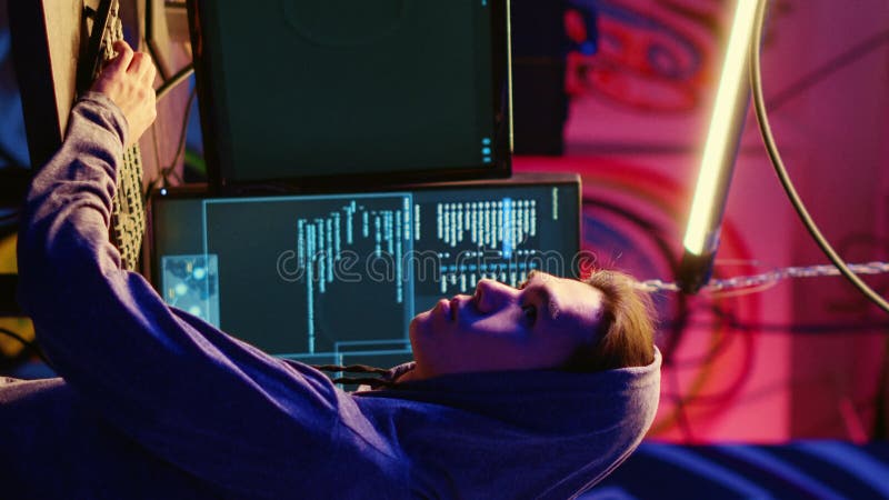 Vertical Video Hacker Focused on Cracking Devices Stock Footage - Video ... Vertical Video Hacker Focused on Cracking Devices Stock Footage - Video ...