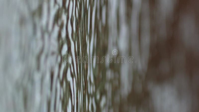 Vertical Video. Small Raindrops Fall into a Rain Puddle in Real Time ...